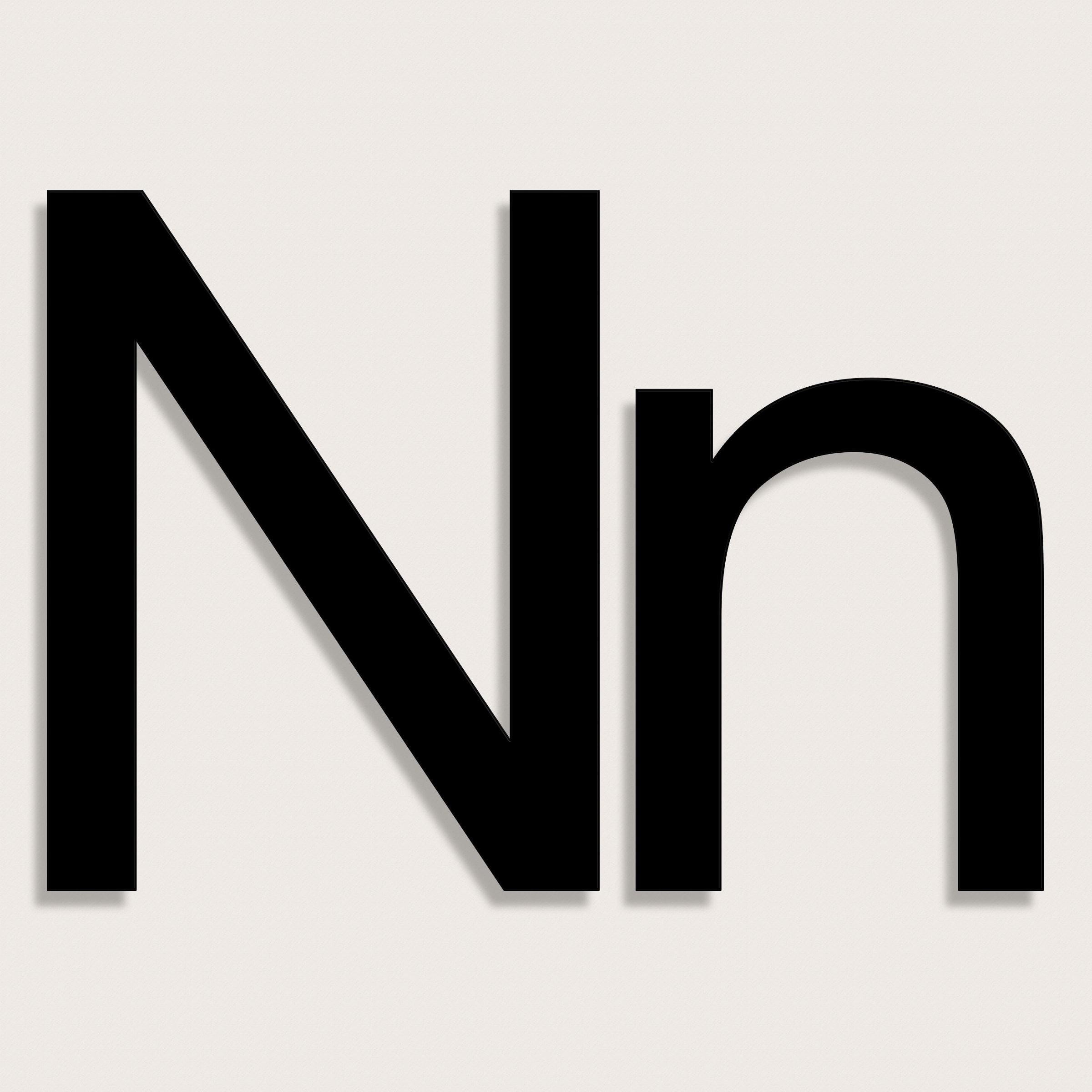 Fasadbokstav N i Plexiglas - Svart eller vit färg - JC Gravyr & Tryck